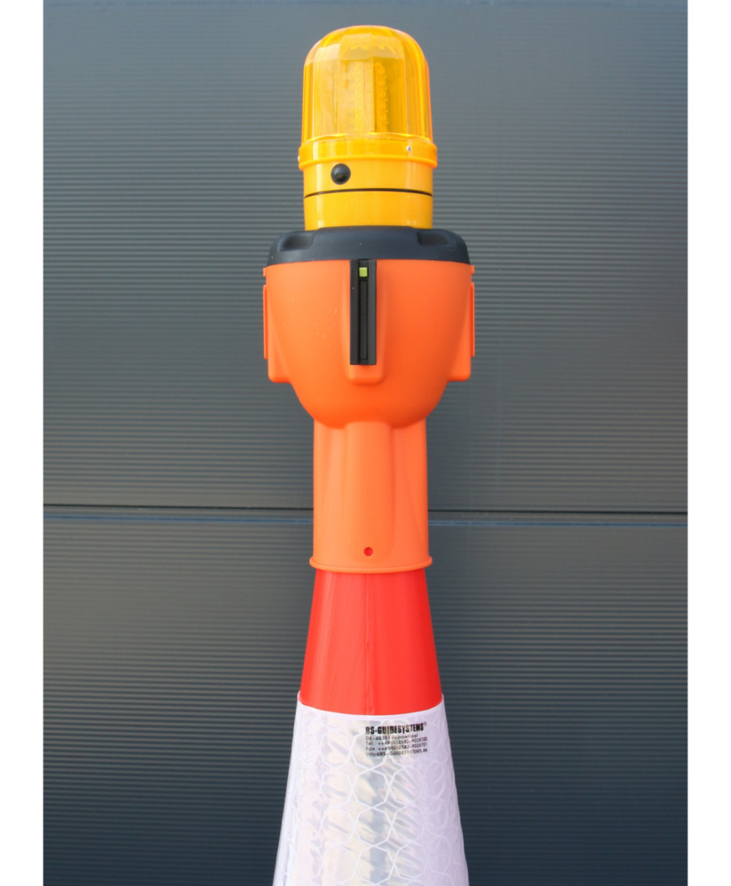 Flashing light attachment for traffic cone